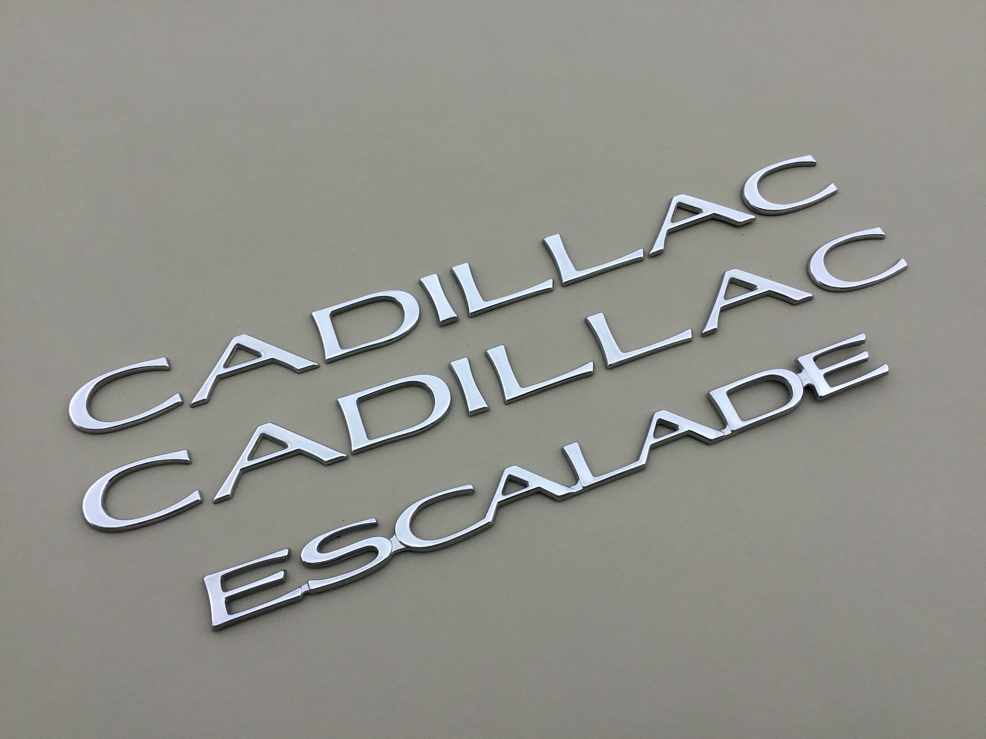 1999-2000 Cadillac Escalade Door & Tailgate Emblem Set
